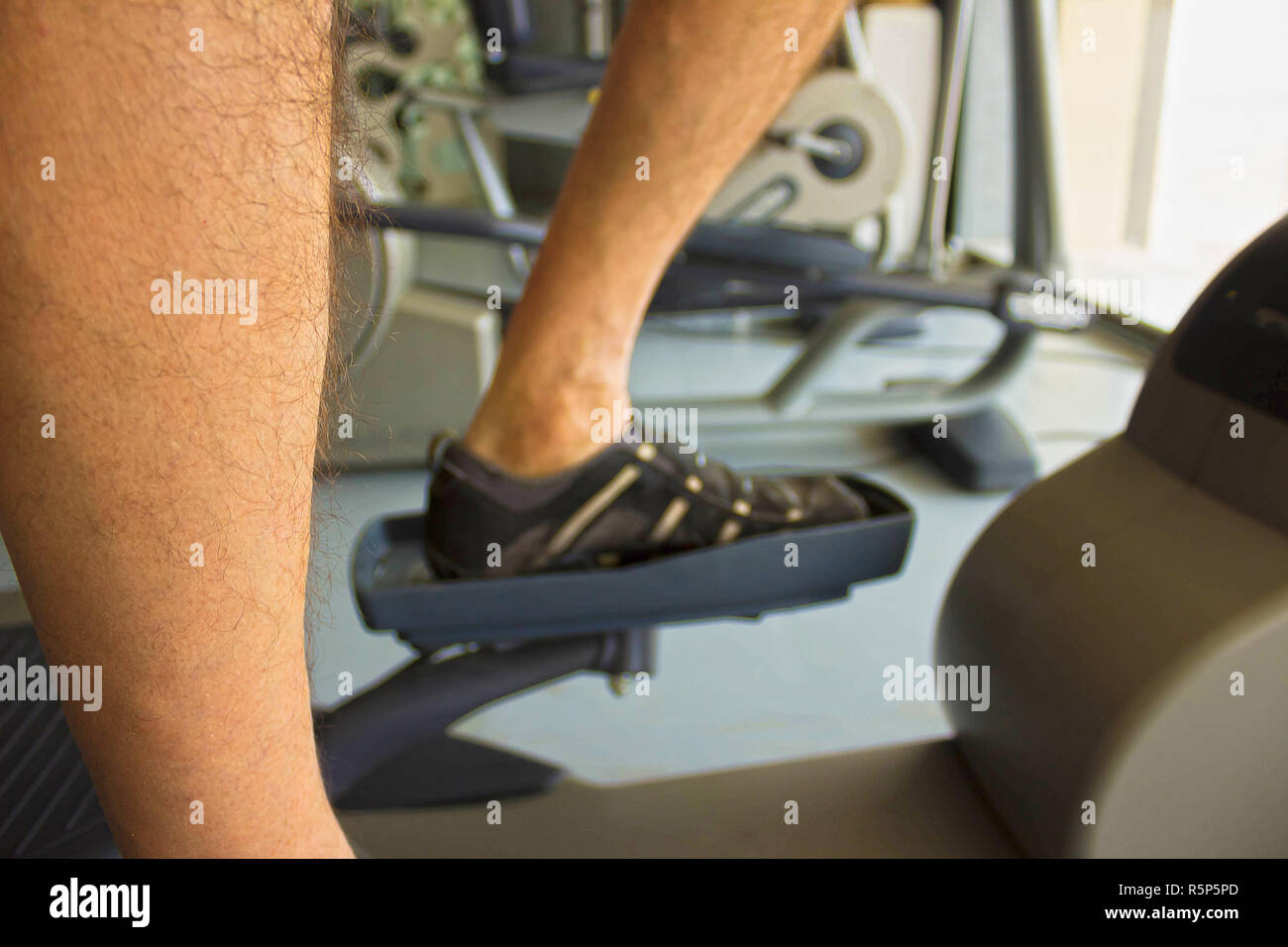 Bicycle fitness with legs Stock Photo - Alamy