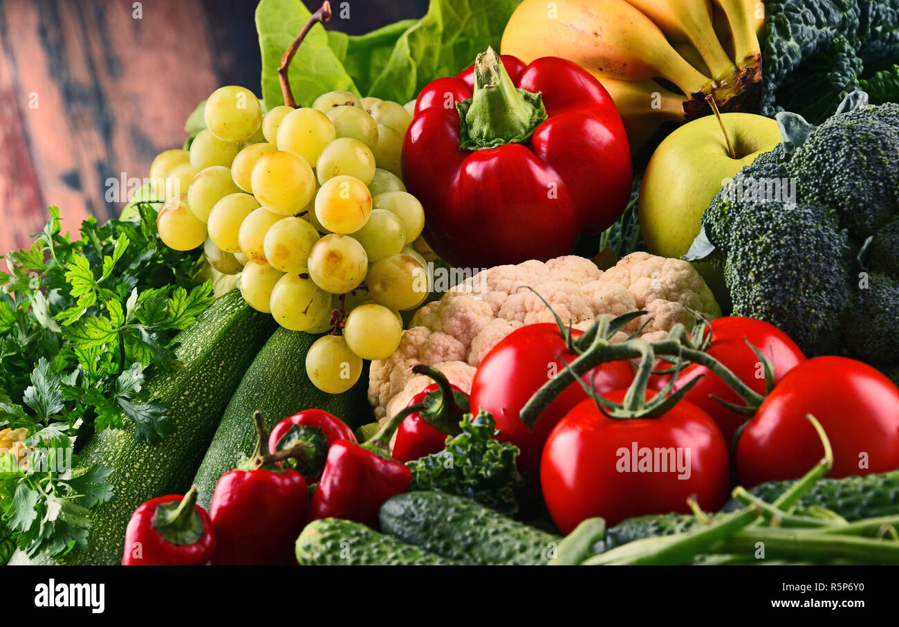 Composition with variety of raw organic vegetables and fruits Stock ...