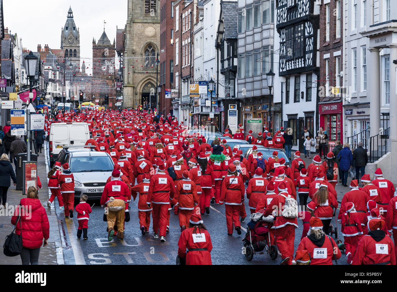 Chester, UK. 2nd December 2018. Runners taking part in the annual Santa ...
