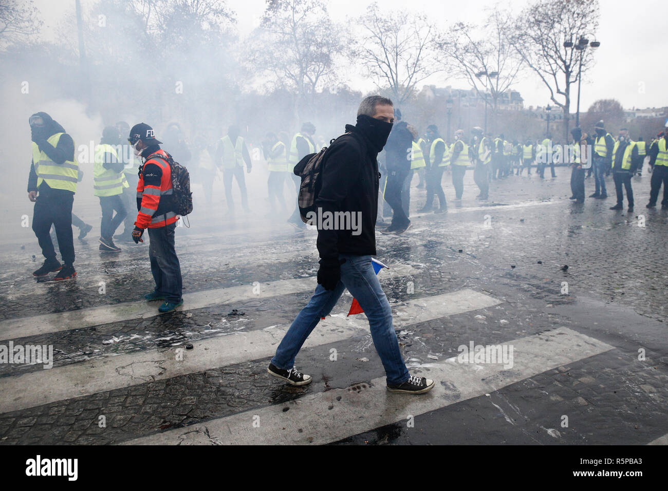 Paris, France. 1st December 2018. Riot Police uses a water canon and ...