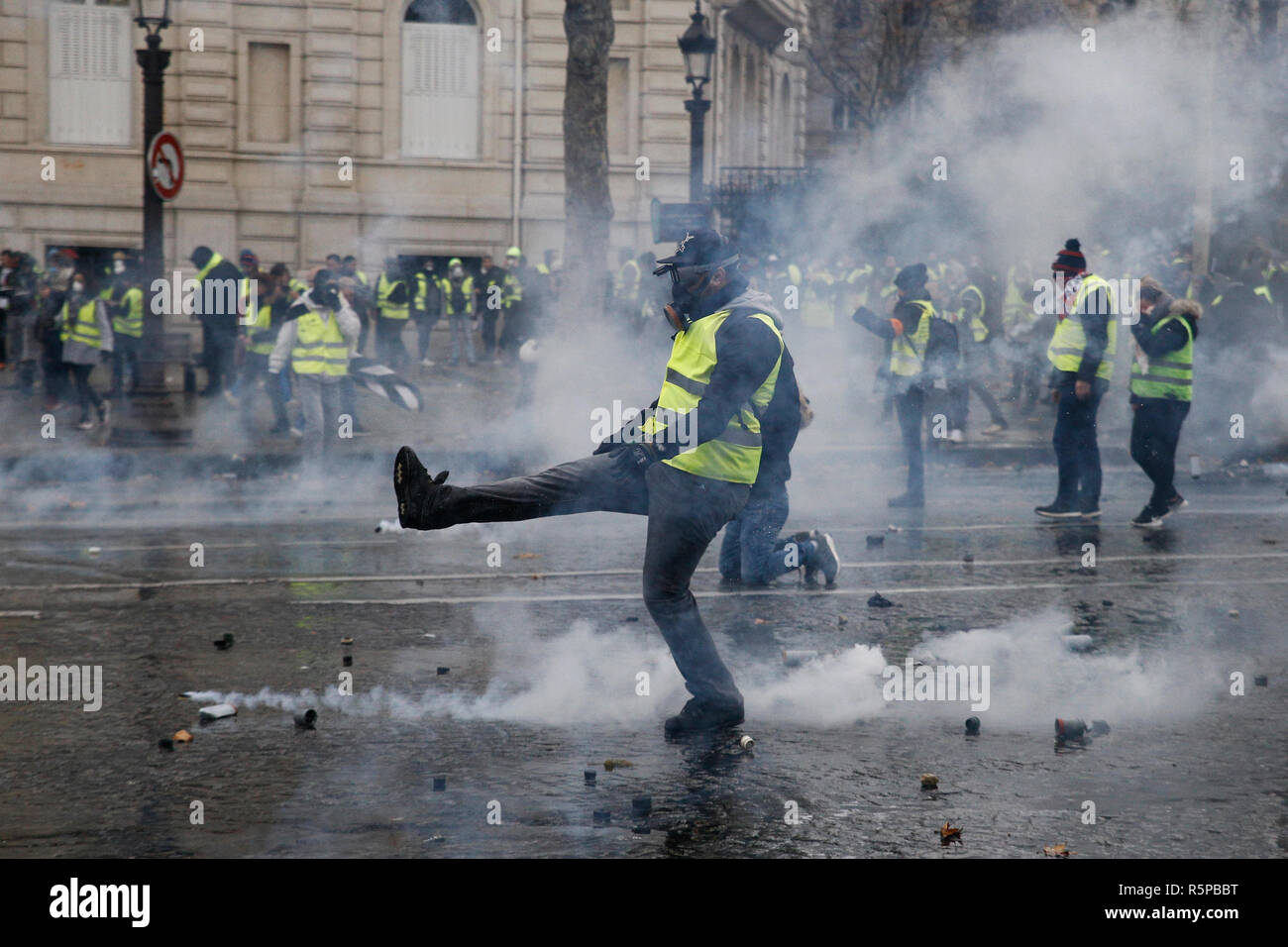 Paris, France. 1st December 2018. Riot Police uses a water canon and ...