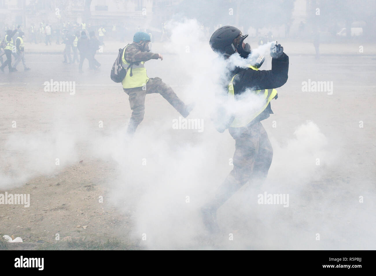 Paris, France. 1st December 2018. Riot Police uses a water canon and ...