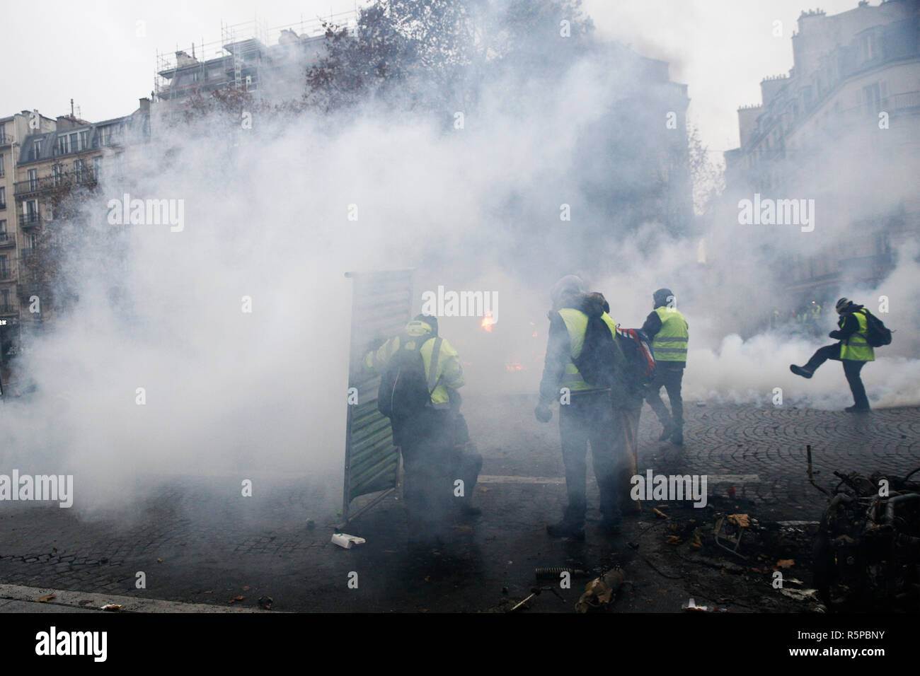 Paris, France. 1st December 2018. Riot Police uses a water canon and ...