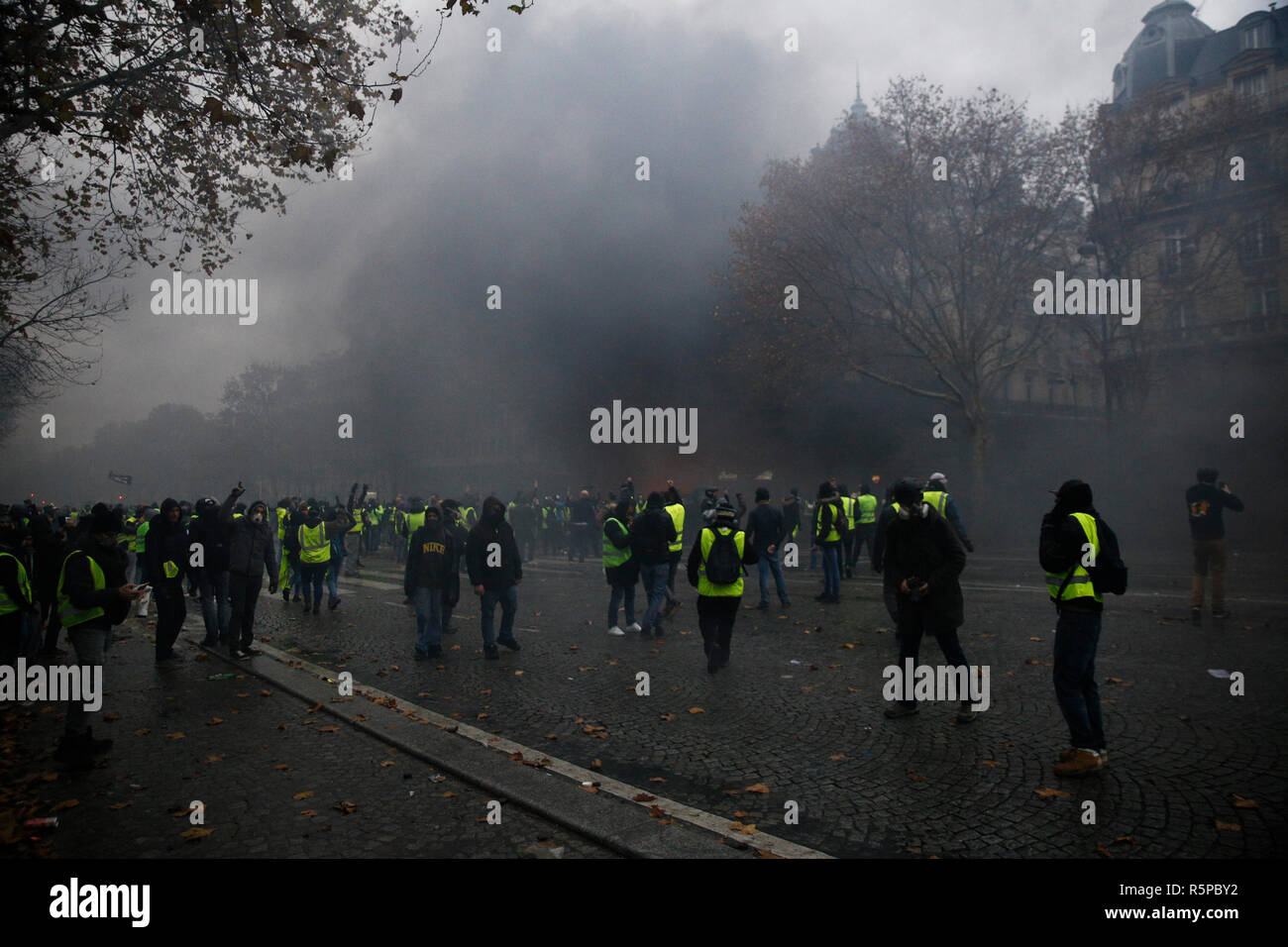 Paris, France. 1st December 2018. Riot Police uses a water canon and ...