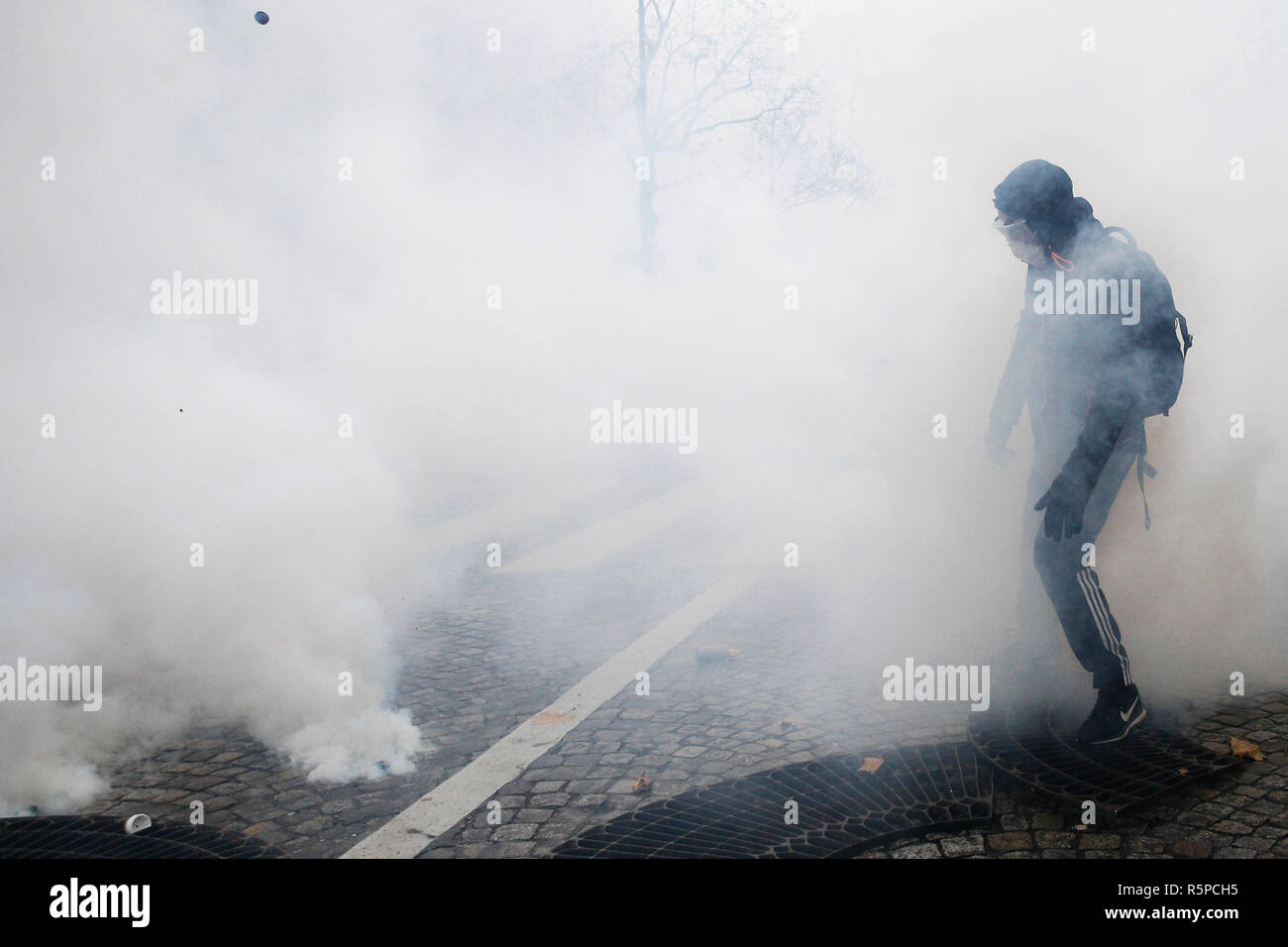 Paris, France. 1st December 2018. Riot Police uses a water canon and ...