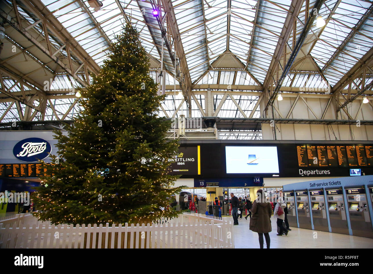 Waterloo Rail Station. London, UK. 2 Dec 2018 - A giant Christmas tree ...