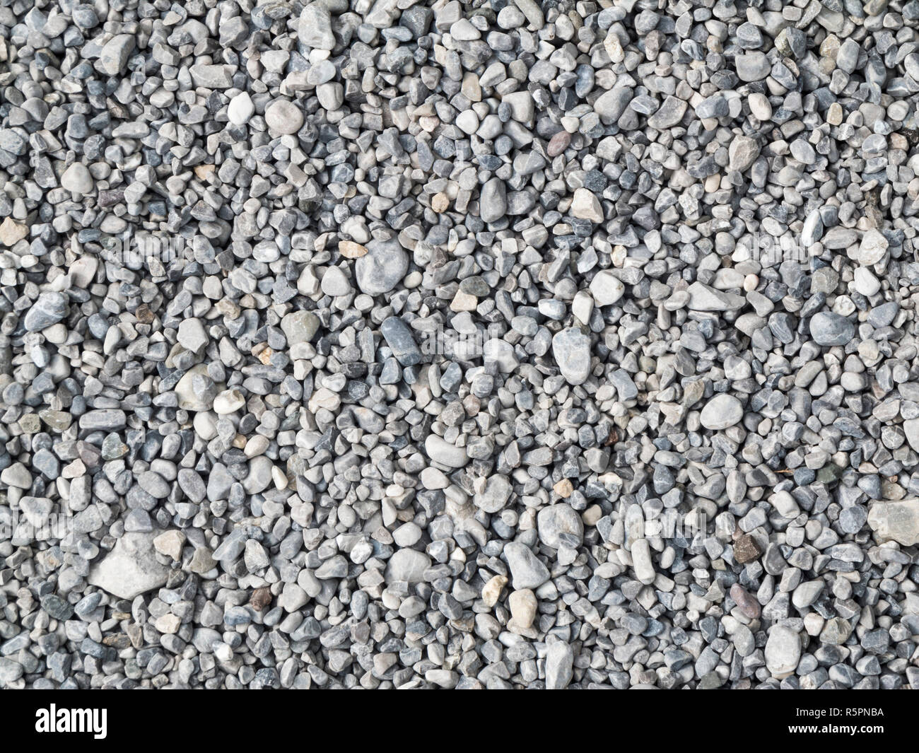 gray pebbles background Stock Photo - Alamy