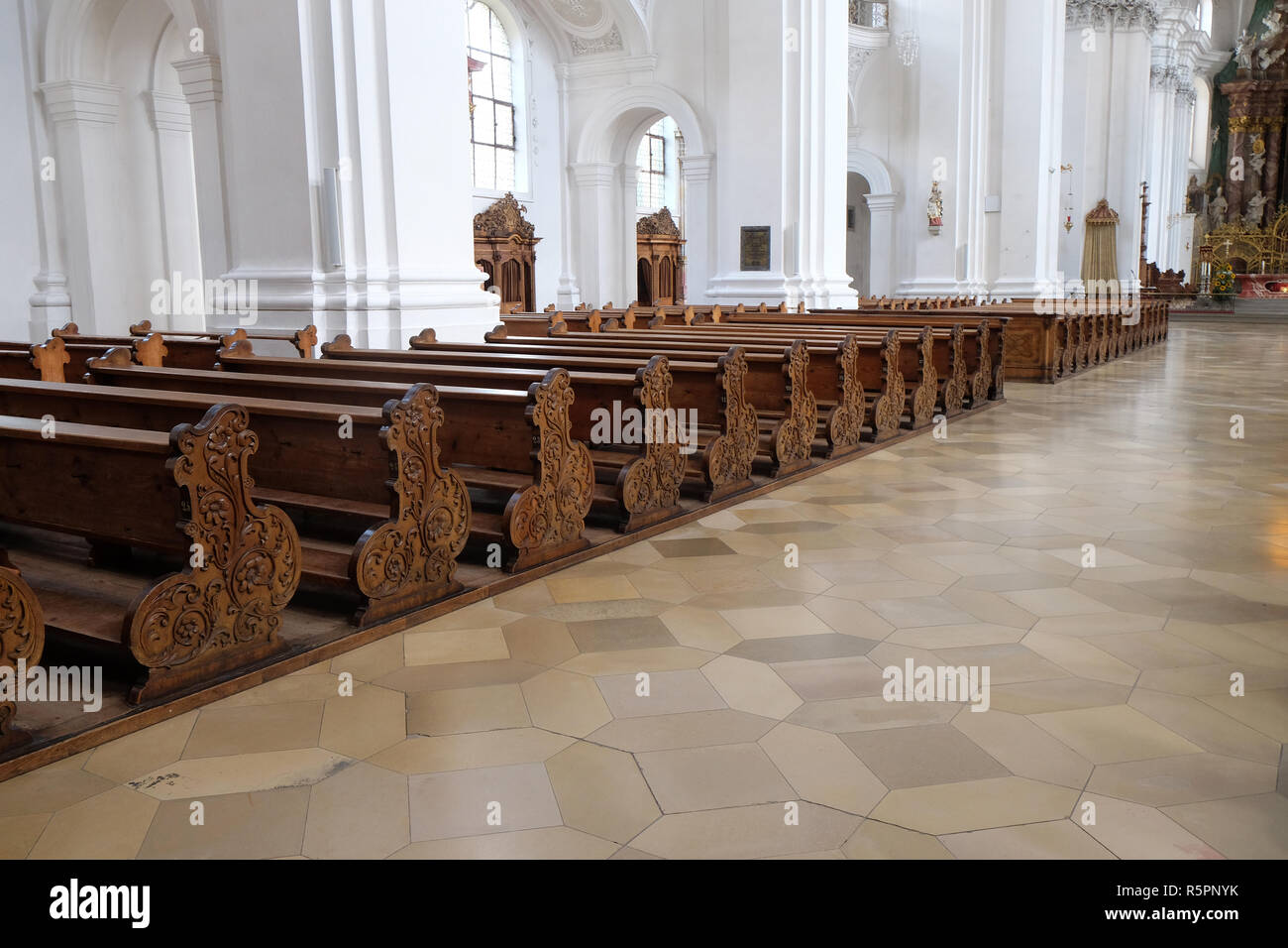 Pews in the Basilica of St. Martin and Oswald in Weingarten, Germany ...