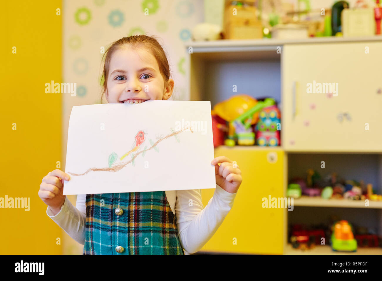 Child holding artwork proud hi-res stock photography and images - Alamy