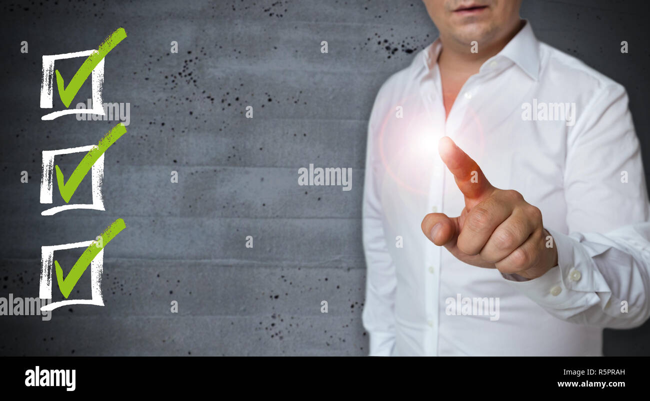 checklist touchscreen is shown by man Stock Photo - Alamy