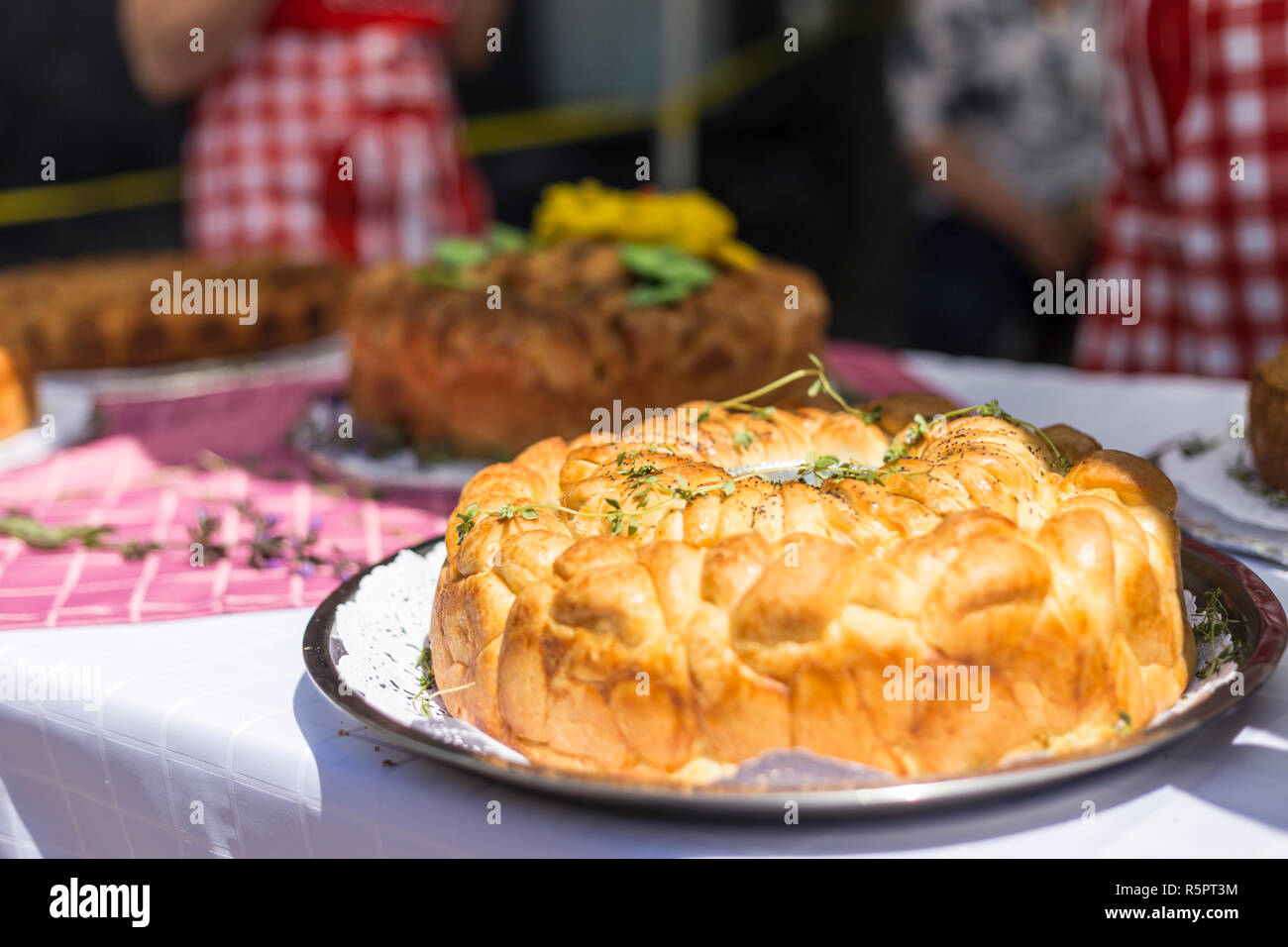 Traditional bulgarian bread called Pita. Decorated with sesame and ...