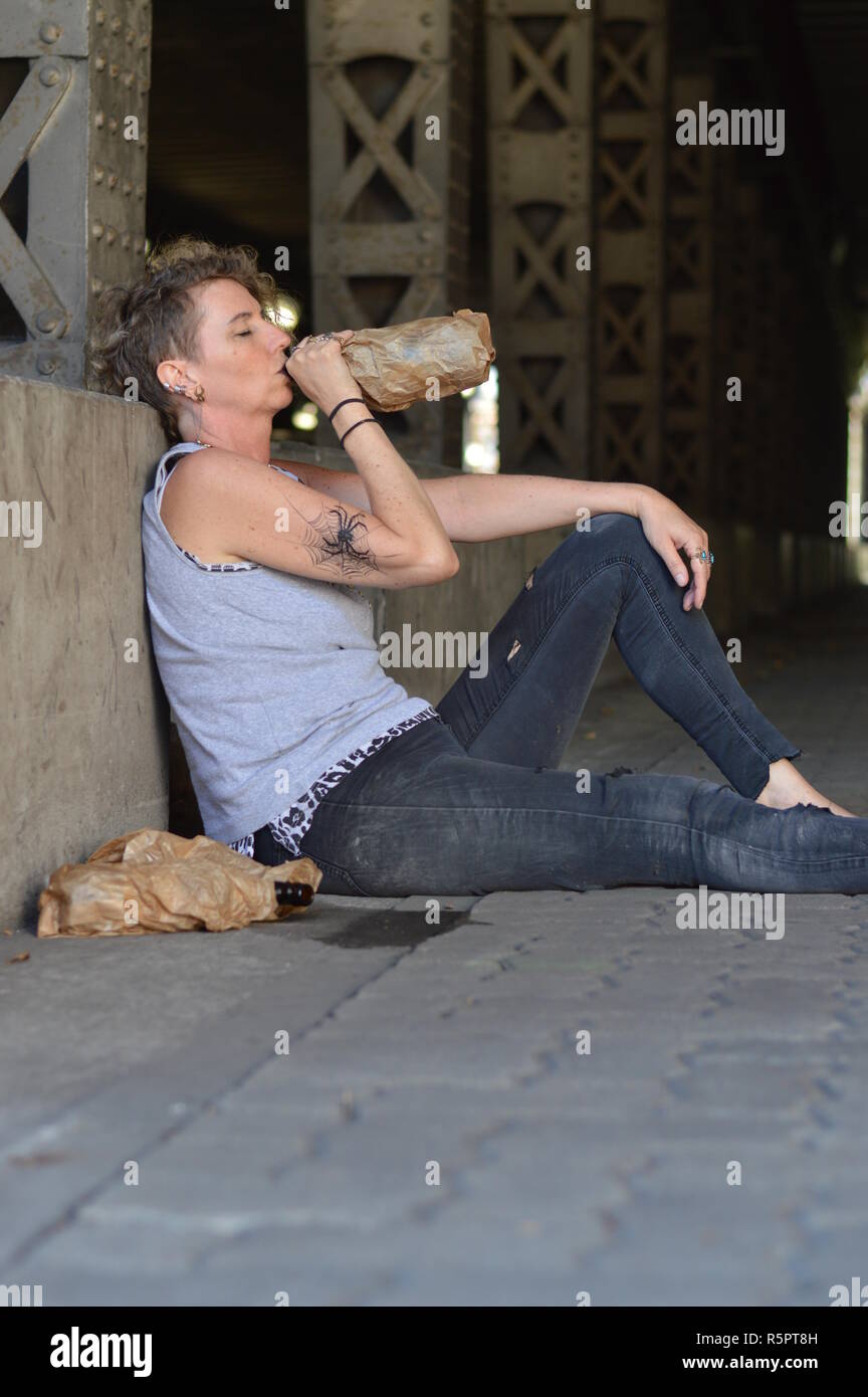 Homeless woman barefoot hi-res stock photography and images - Alamy