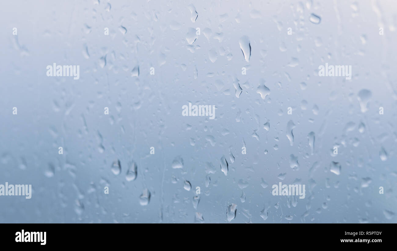 View raindrops falling on window hi-res stock photography and images ...