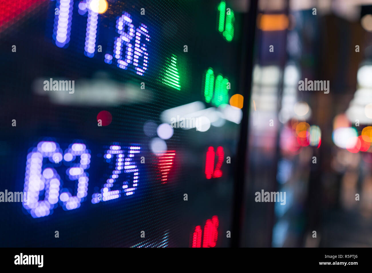 Stock market display at night Stock Photo - Alamy