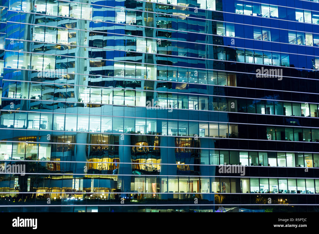 Office building at night Stock Photo - Alamy