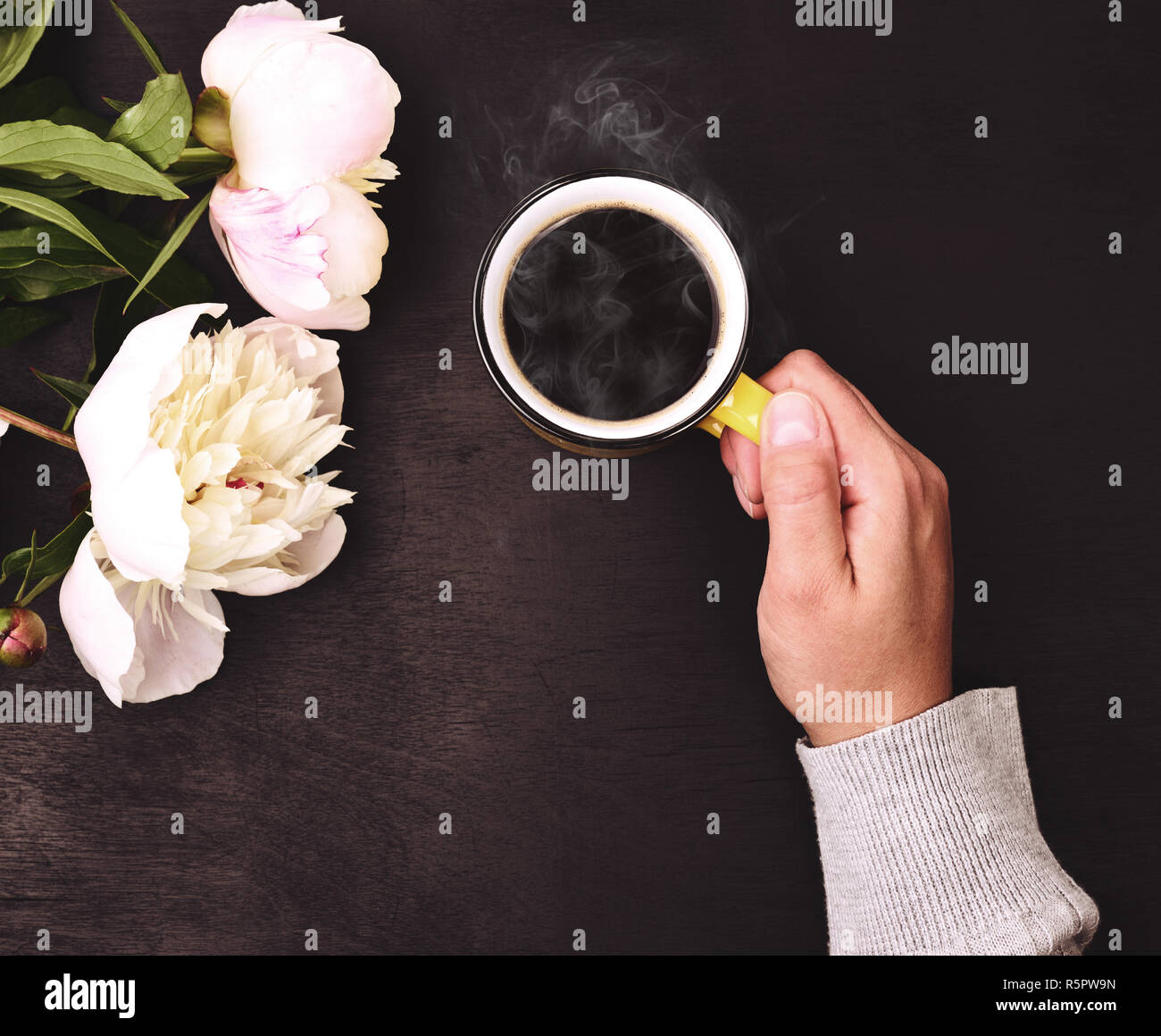 cup of hot black coffee in a human hand Stock Photo - Alamy