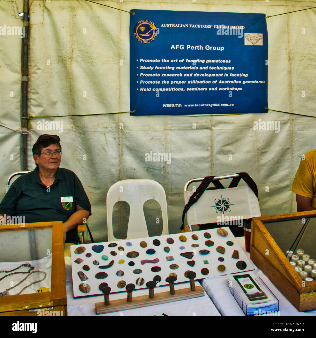 Faceting semi precious stones for seniors hi-res stock photography and ...