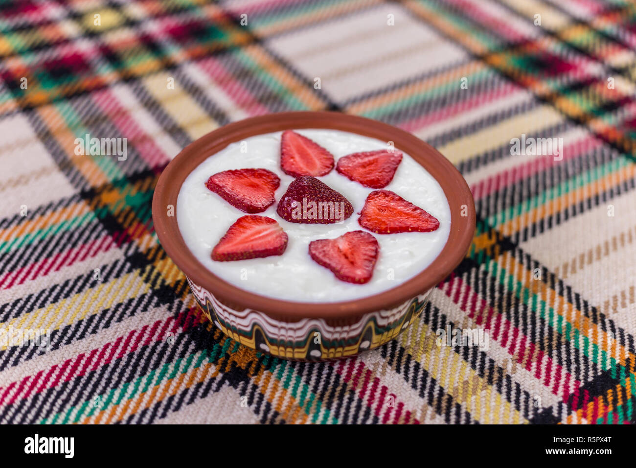 Stirring yogurt in traditional bulgarian hi-res stock photography and ...