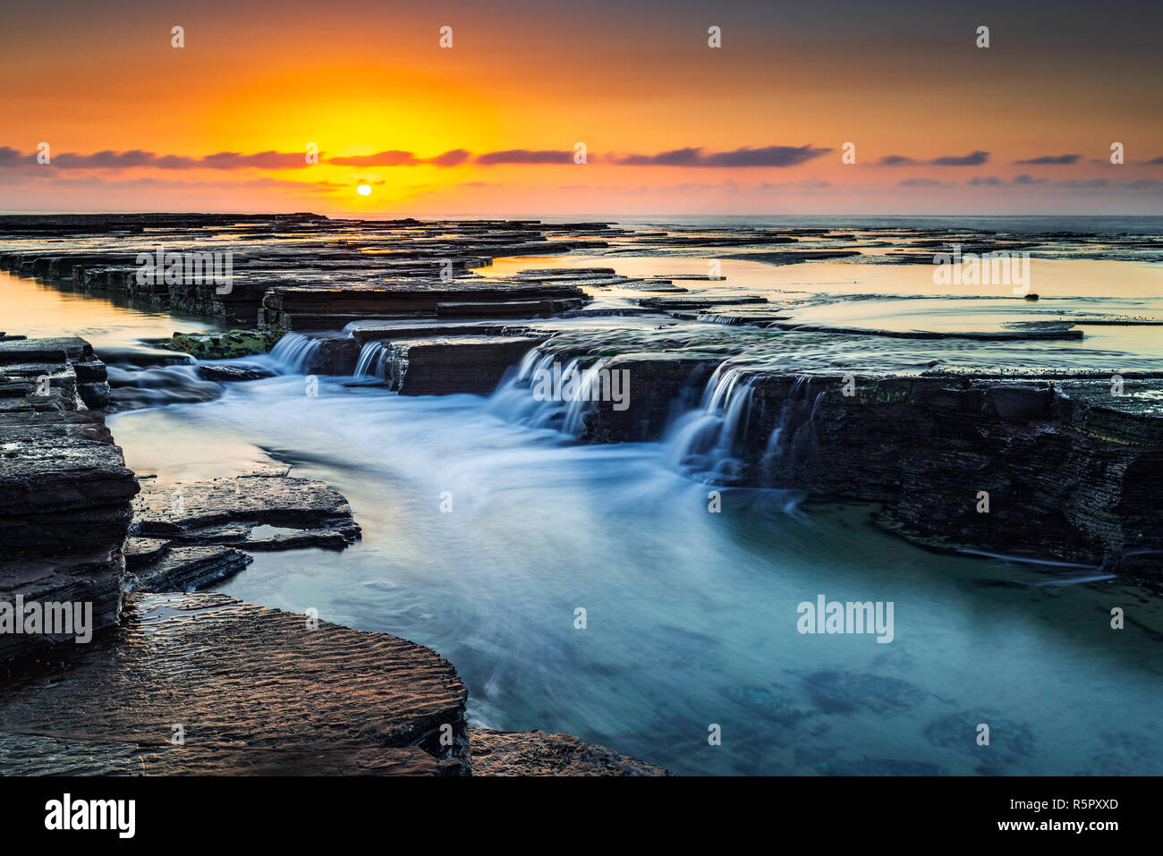 Sunrise at Austinmer Beach, Australia. Morning glow on the South Coast ...