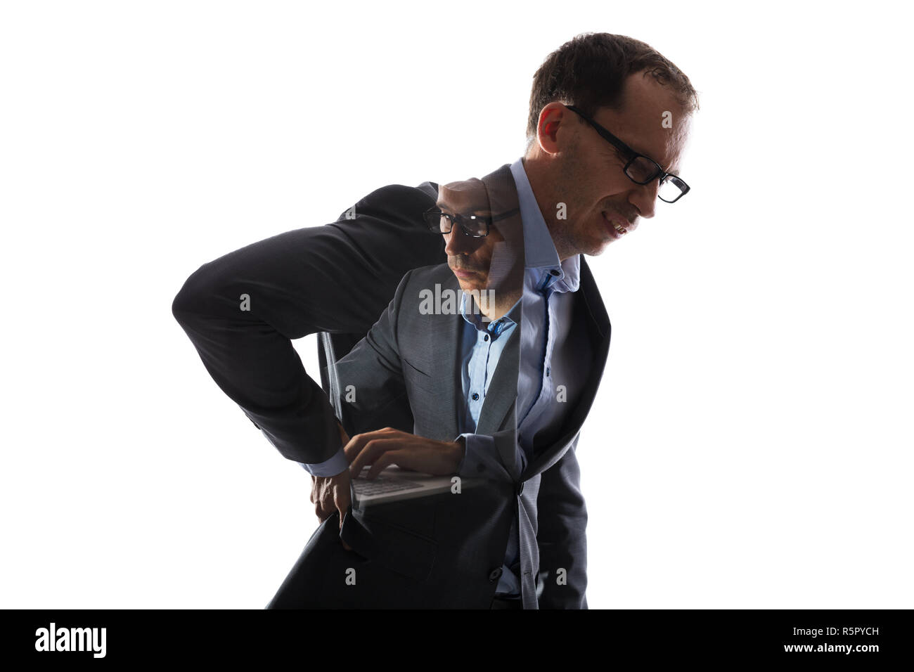 Working businessman having back pain hi-res stock photography and ...