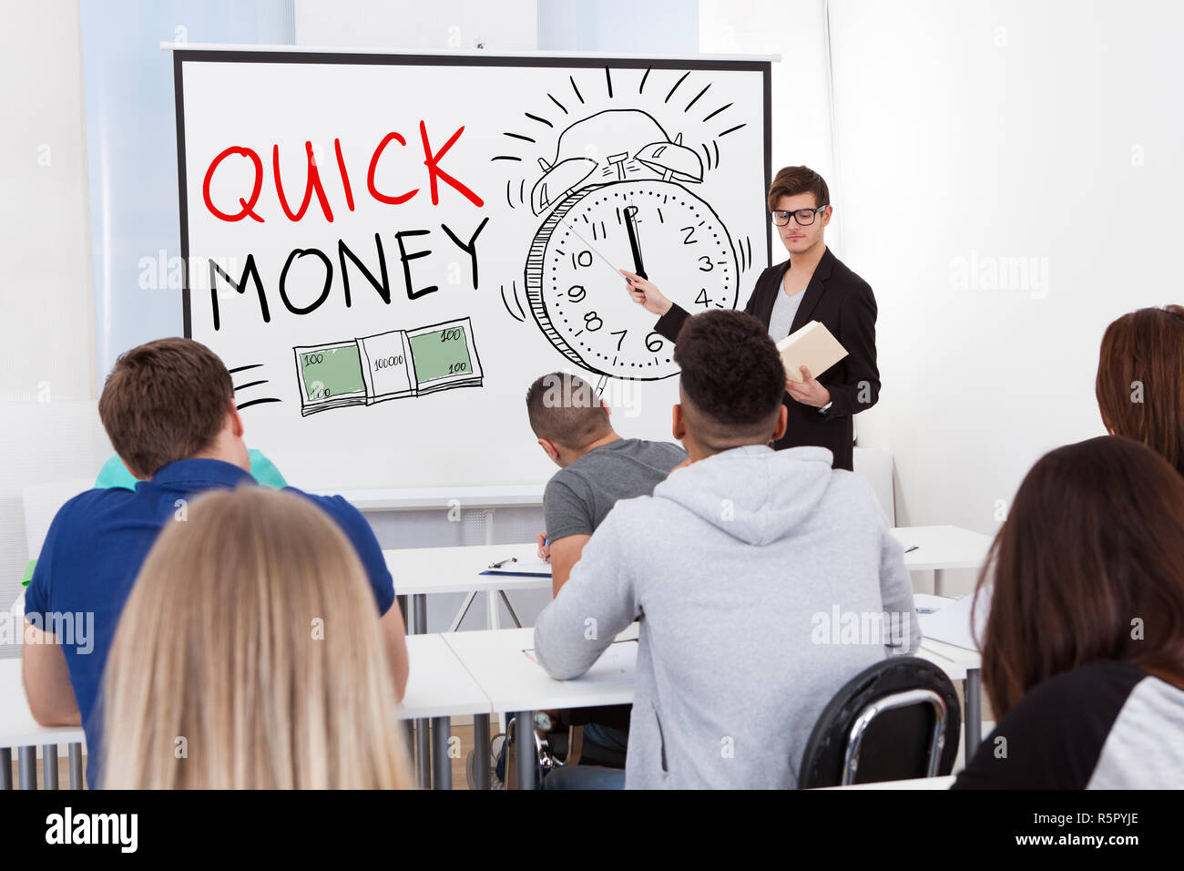 Teacher Teaching Graphs To College Students Stock Photo - Alamy