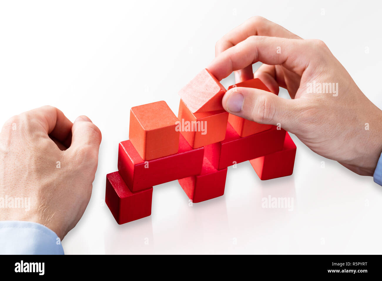 Person placing house model hi-res stock photography and images - Alamy