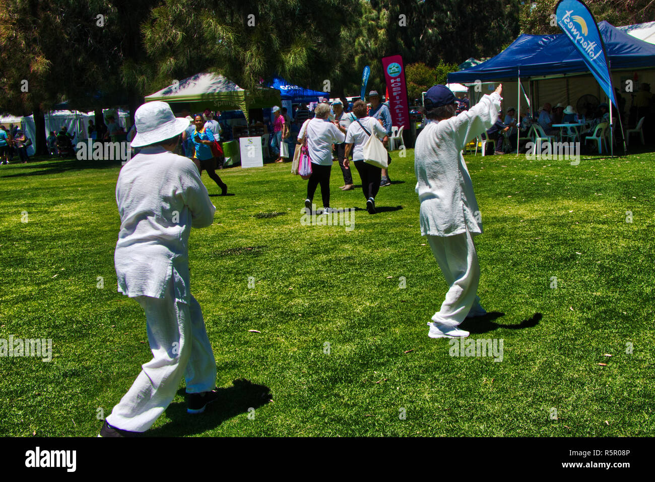 seniors moving smoothly on have a go day Stock Photo - Alamy