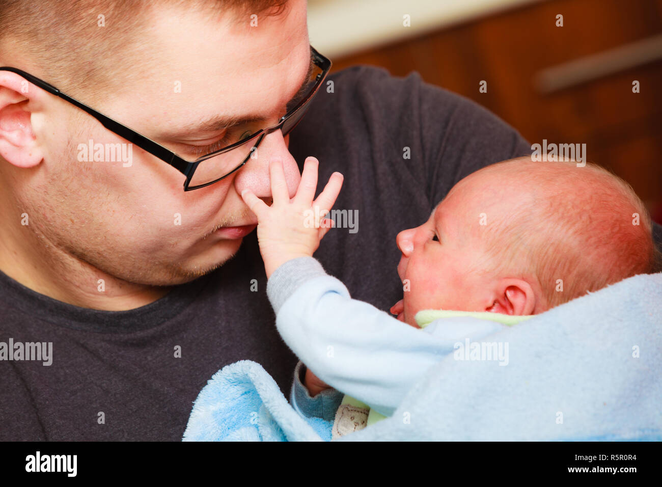 Family, fatherhood concept. Daddy holding his little newborn baby ...