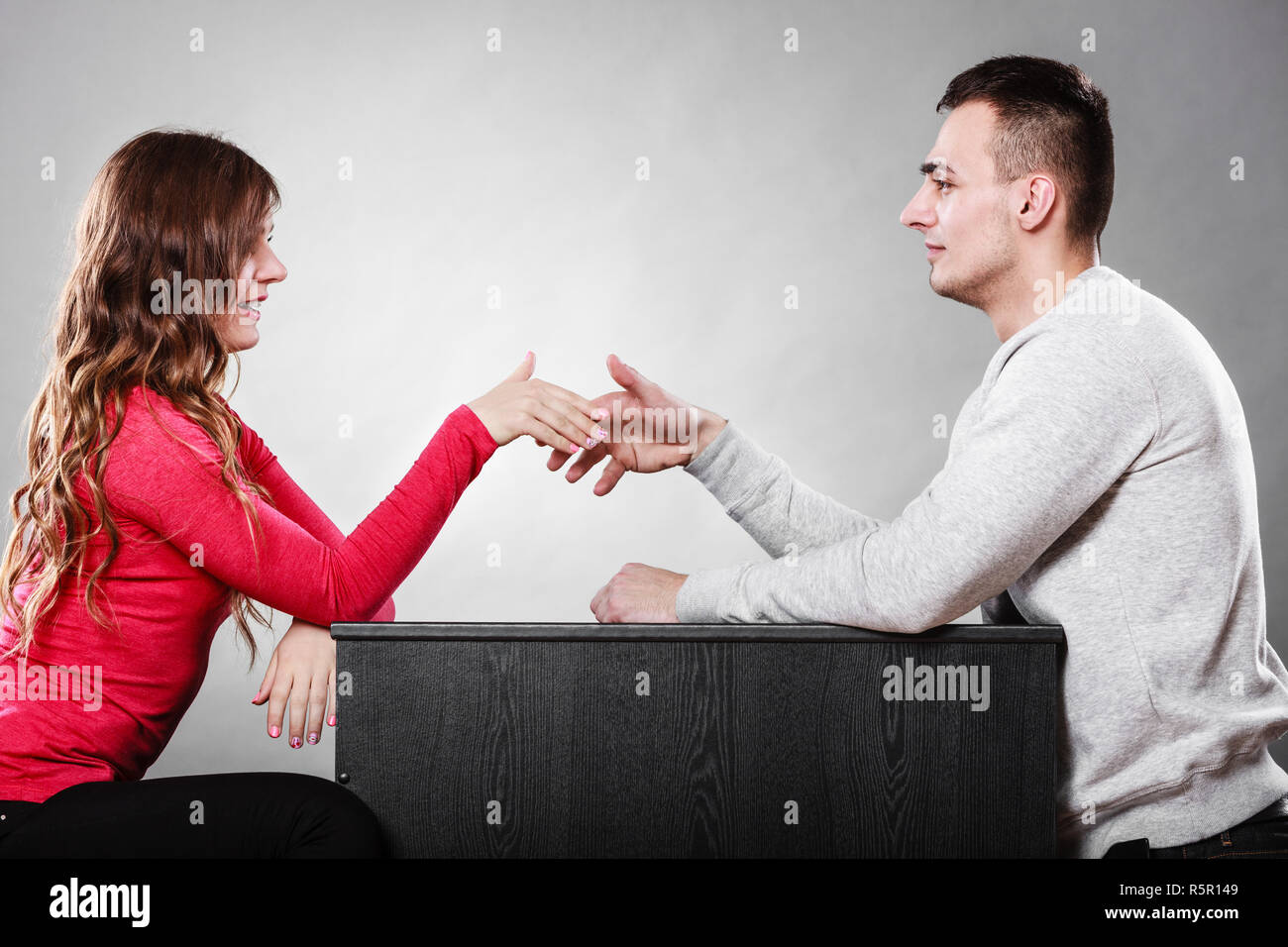 Man and woman first date meeting. Handshake greeting. Male and female ...