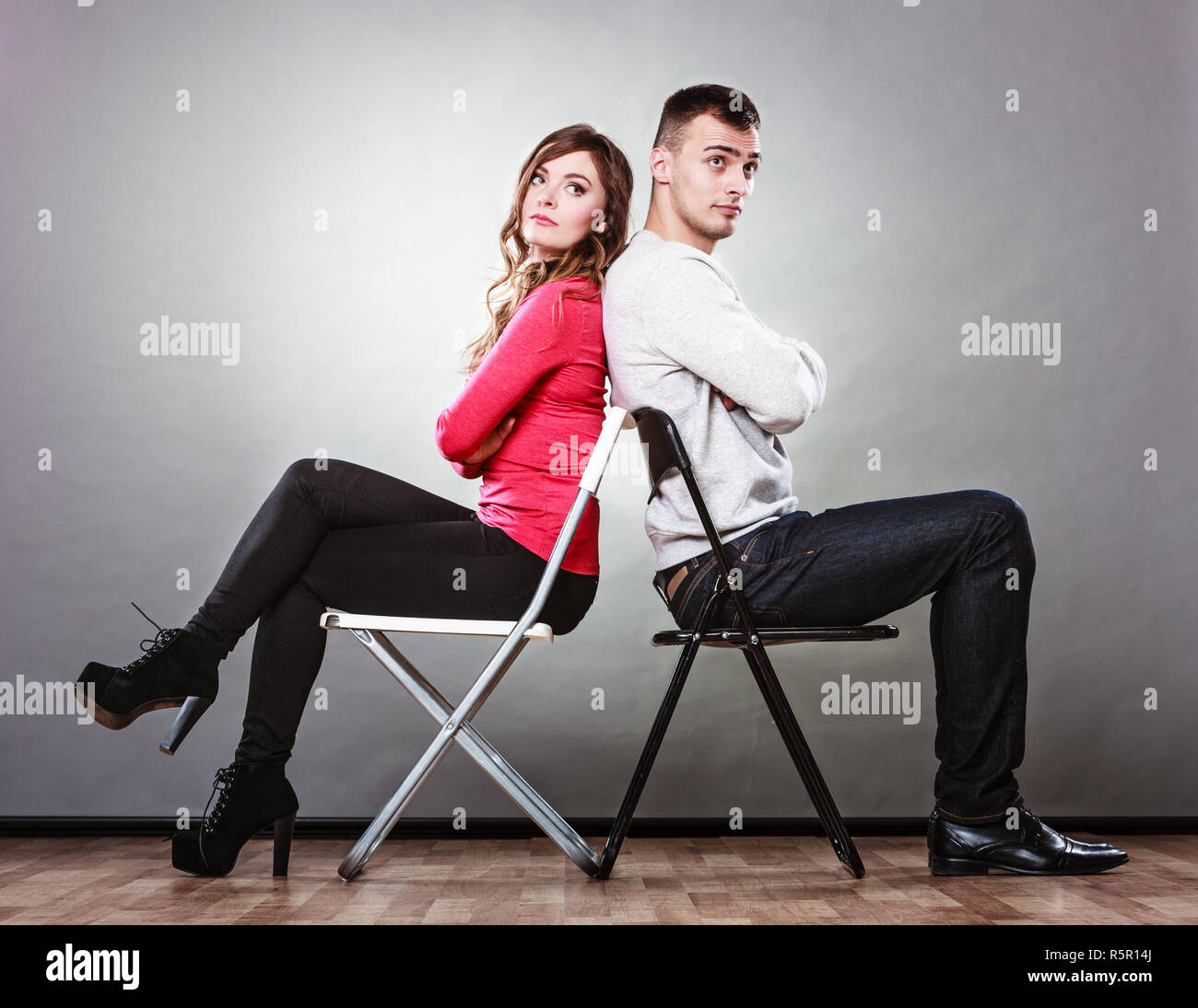 Sit insulted back to back hi-res stock photography and images - Alamy