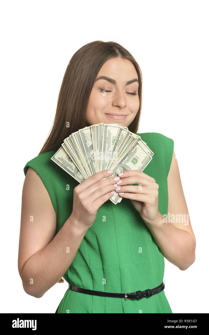 Beautiful woman with money on white background Stock Photo - Alamy