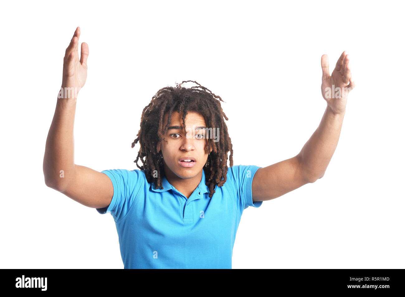 Young man posing against white background isolated Stock Photo - Alamy