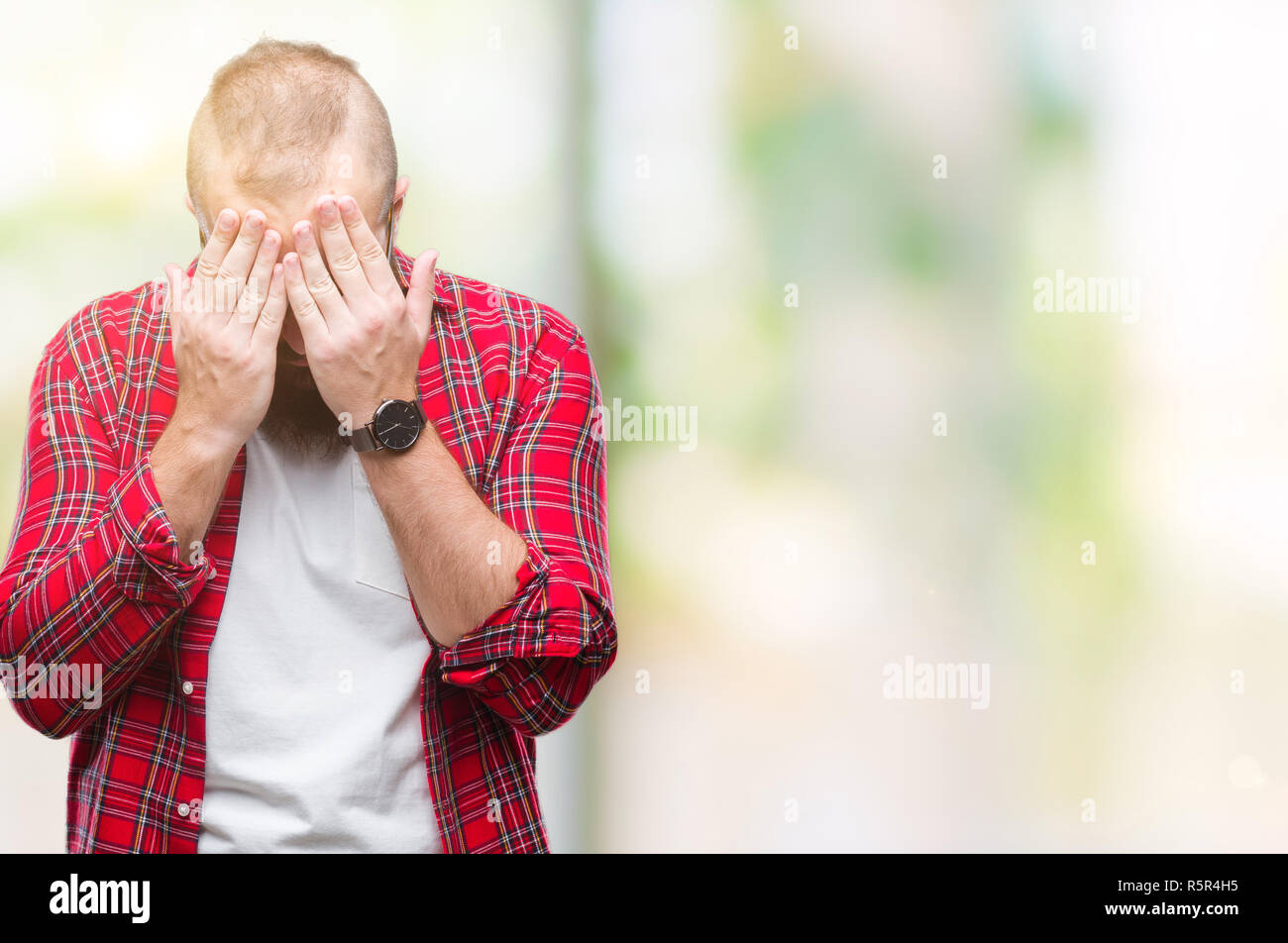 Young caucasian hipster man wearing glasses over isolated background ...