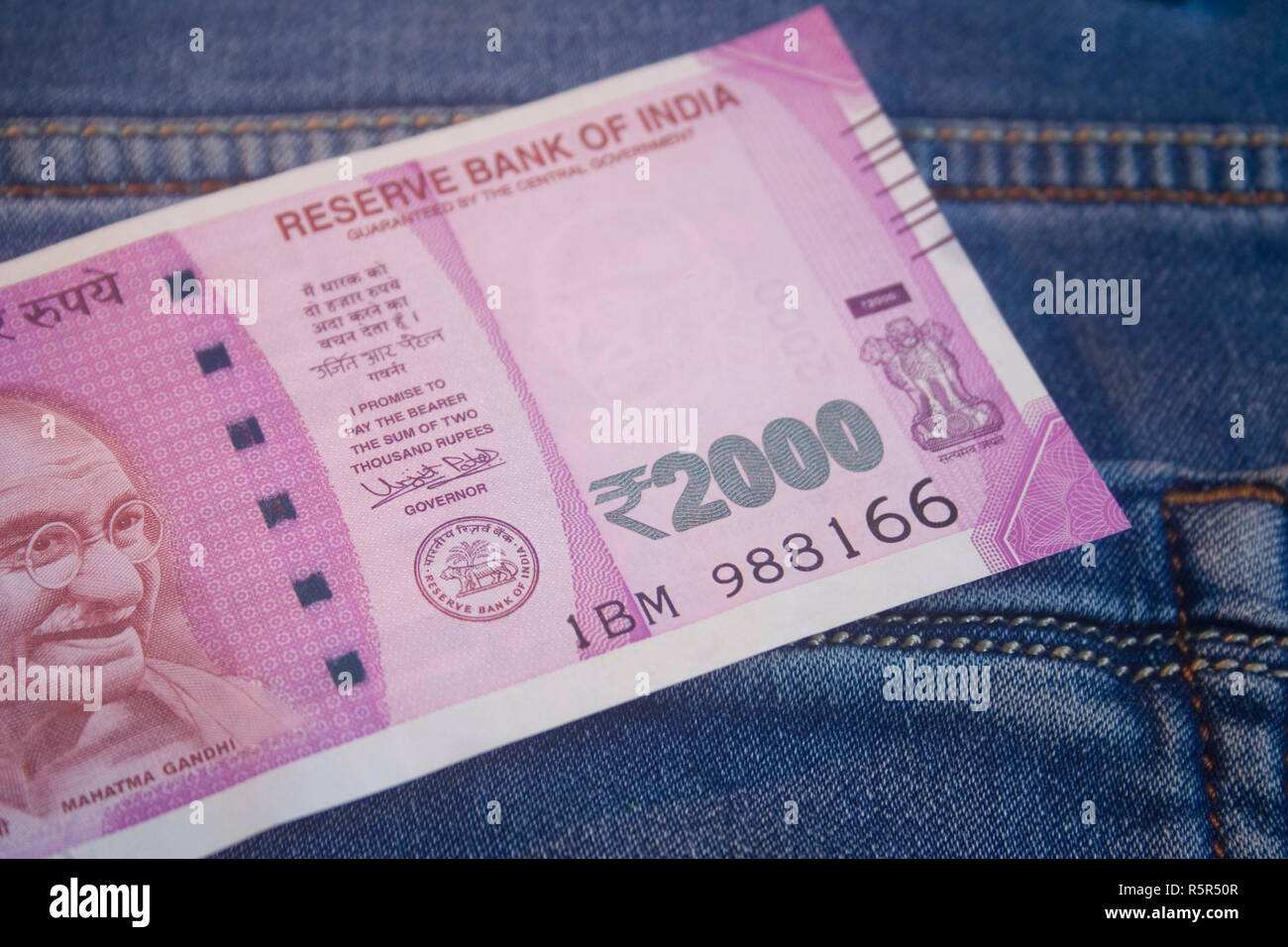 2000 Rupees Indian Currency jeans pocket money Stock Photo - Alamy