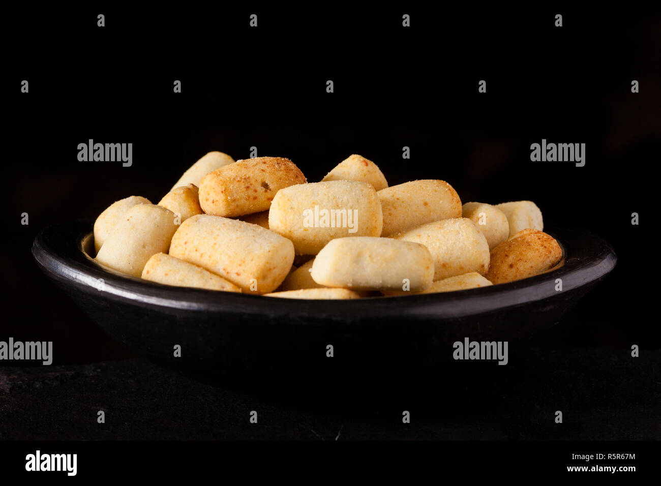 Traditional snack from Colombia called achira on black background Stock ...