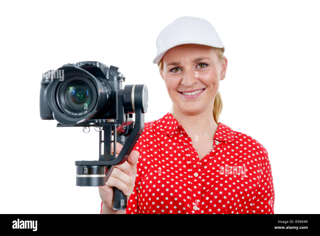 woman videographer using steady cam, on white Stock Photo - Alamy