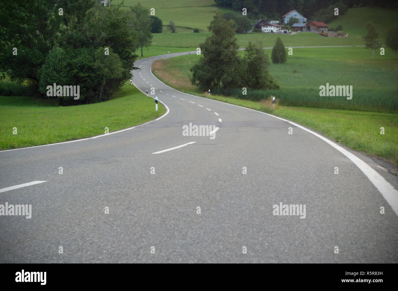 Double curve road traffic sign hi-res stock photography and images - Alamy