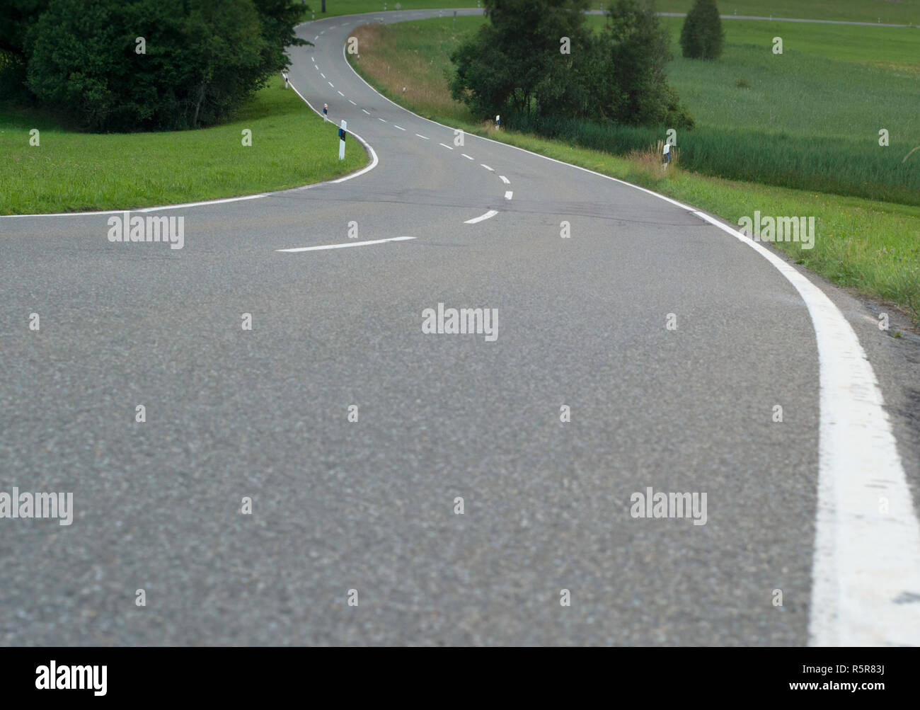 Double curve road traffic sign hi-res stock photography and images - Alamy