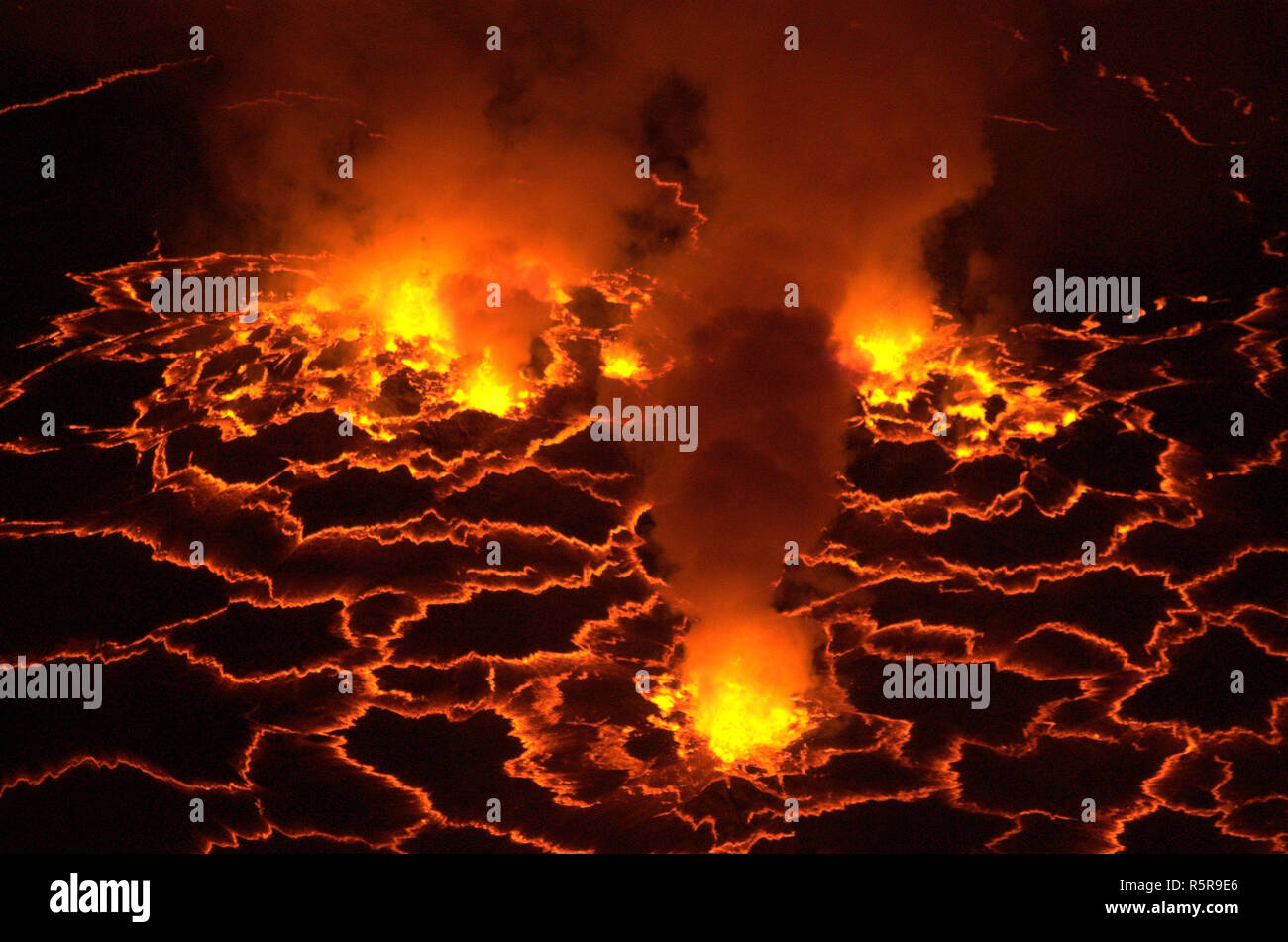 Volcano Lava Pit A Close Up Of A Fire Pit With Rocks Photo