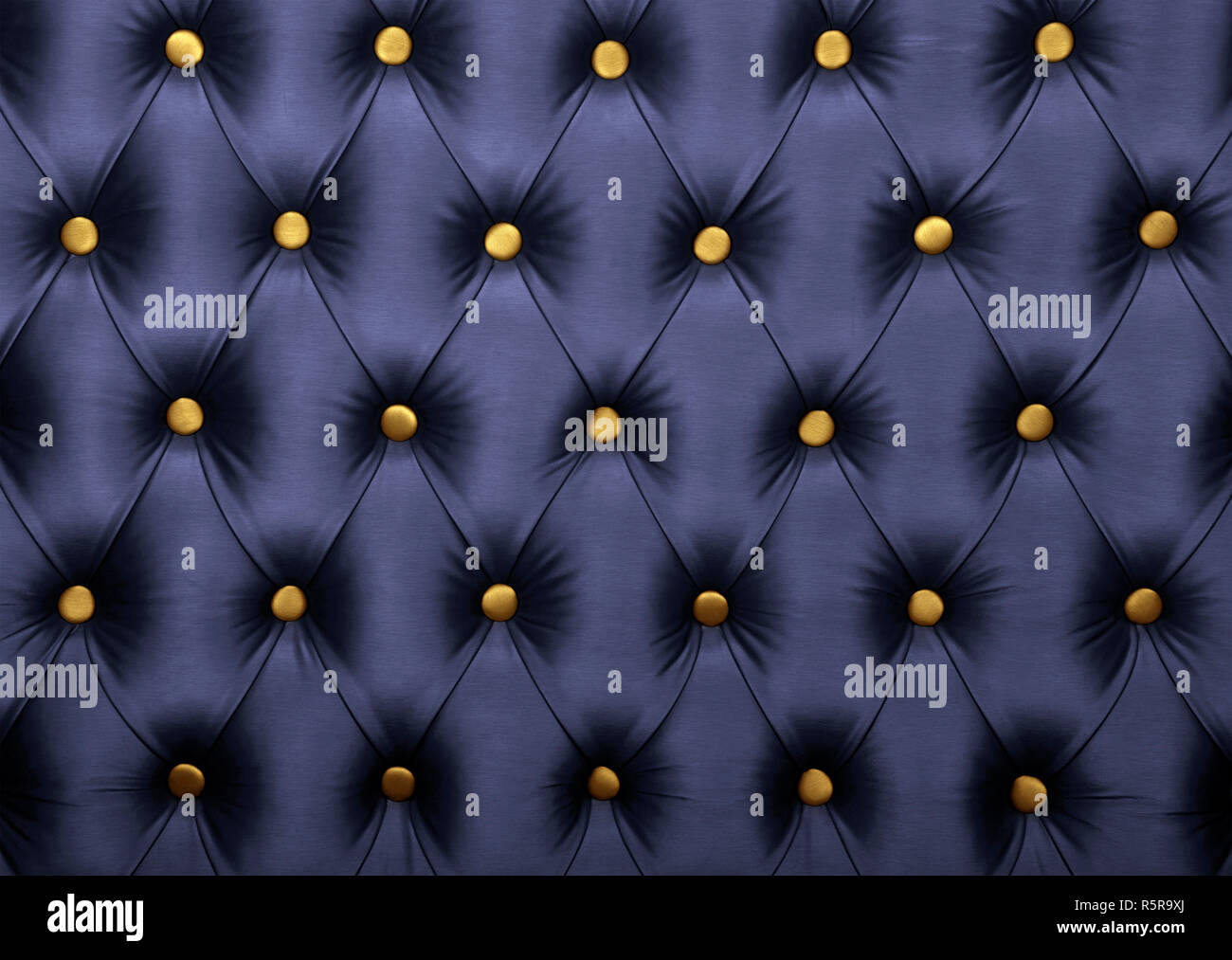 Dark blue capitone with golden buttons texture Stock Photo - Alamy