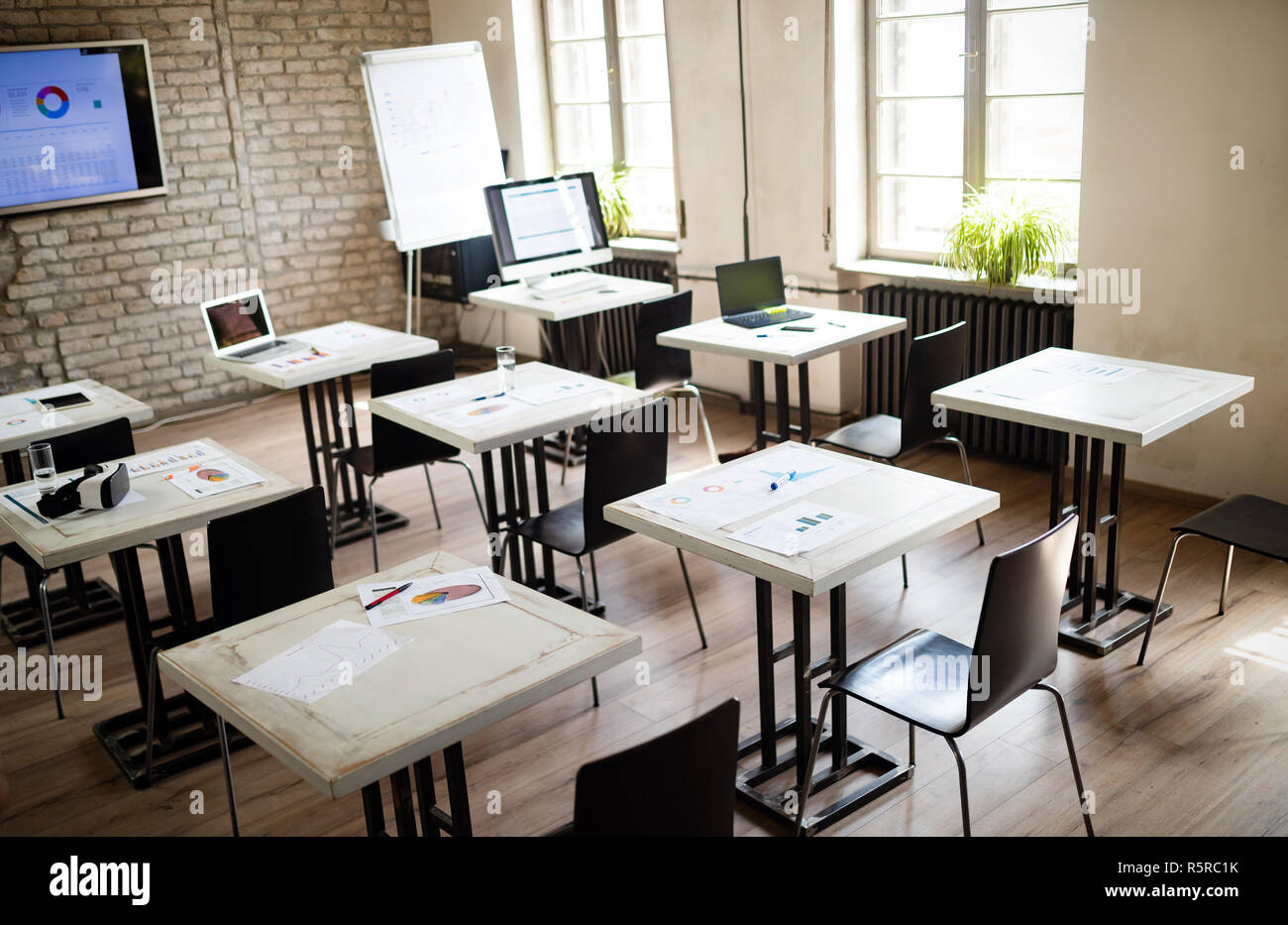 Interior of a modern bright classroom or office Stock Photo - Alamy