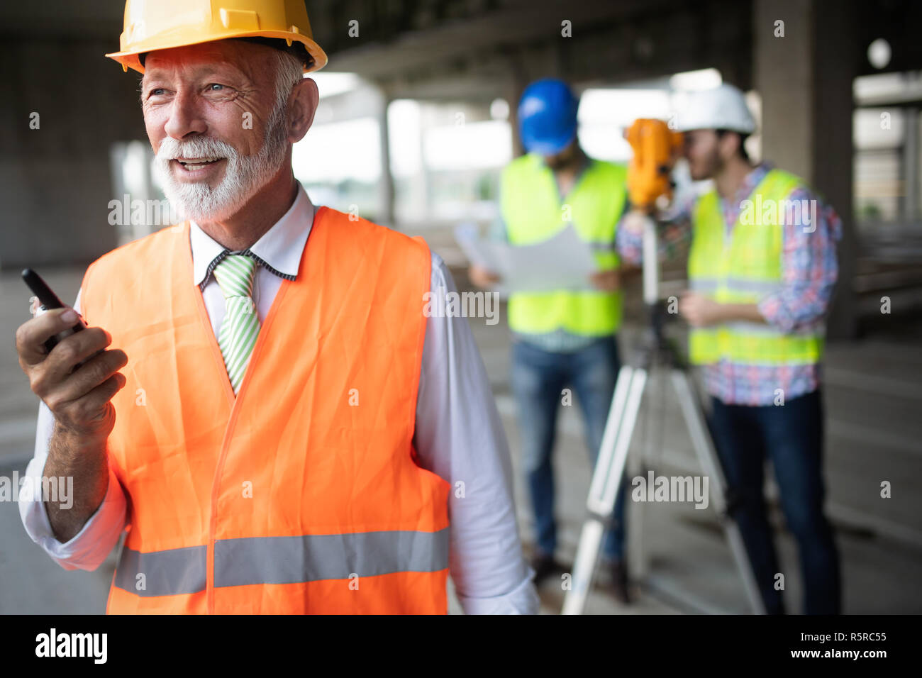 Group of construction engineer working in construction site Stock Photo ...