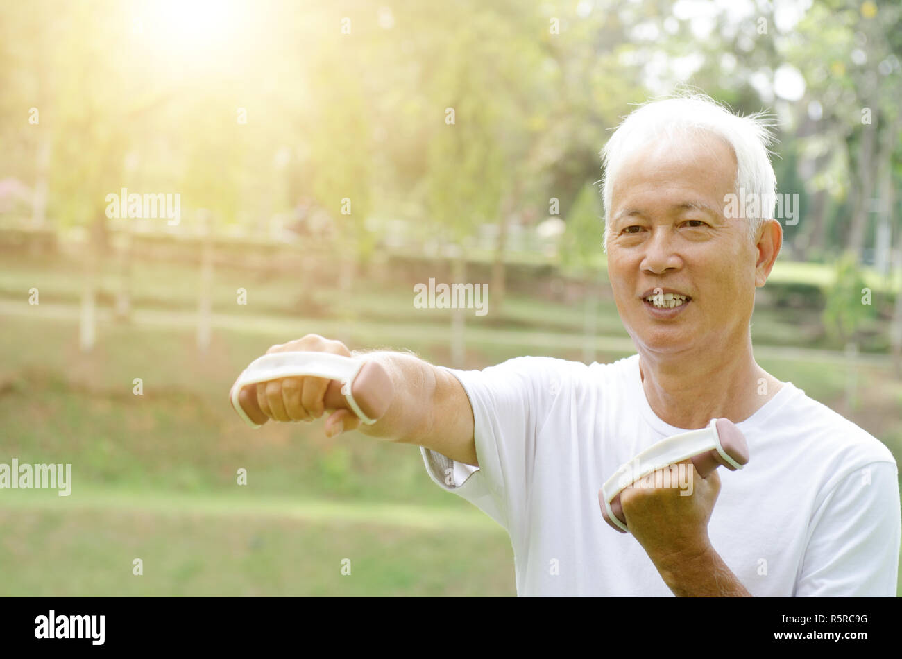 Asian senior people exercise outdoor Stock Photo - Alamy