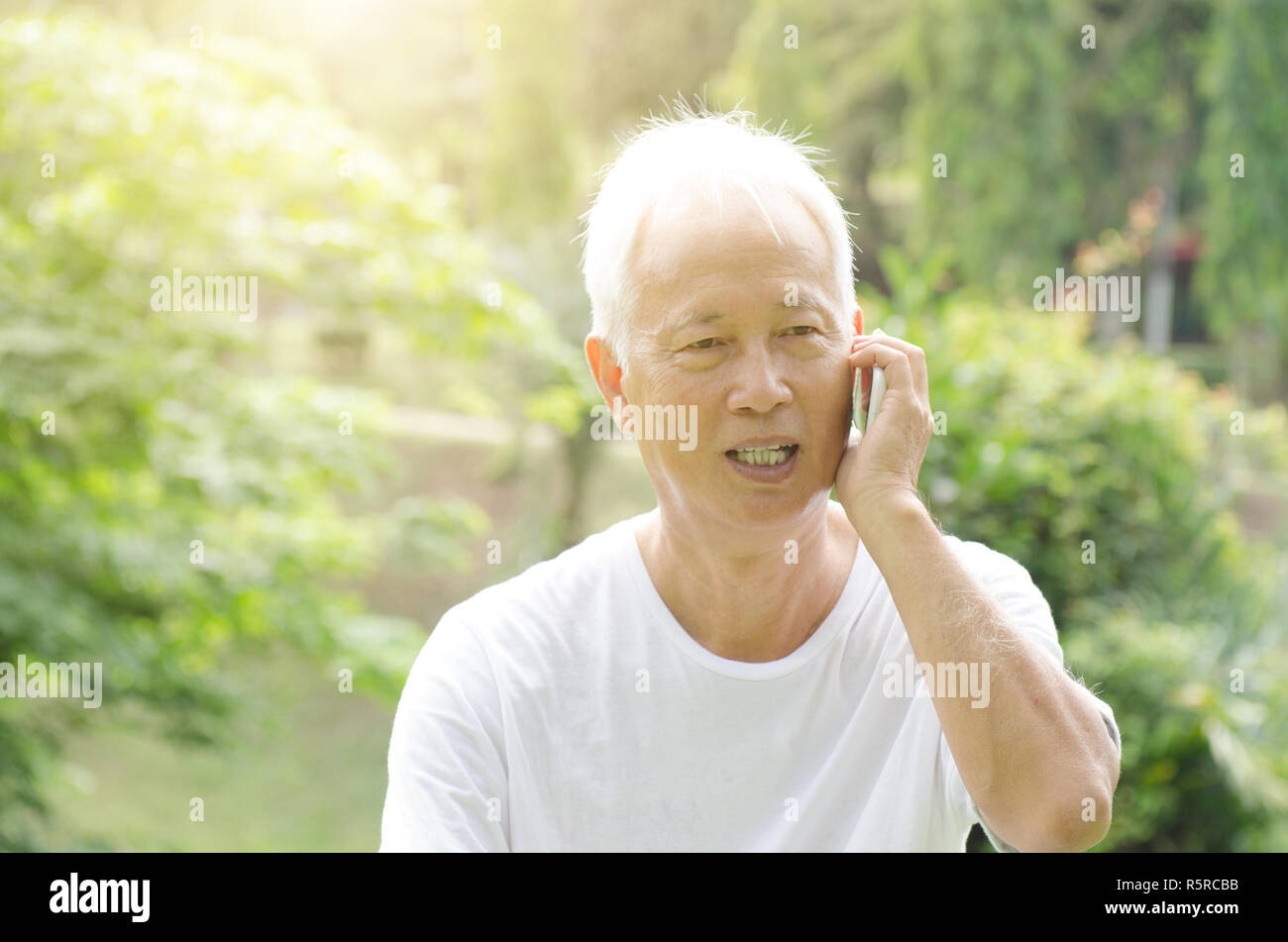 Joyful man grandfather talking hi-res stock photography and images - Alamy