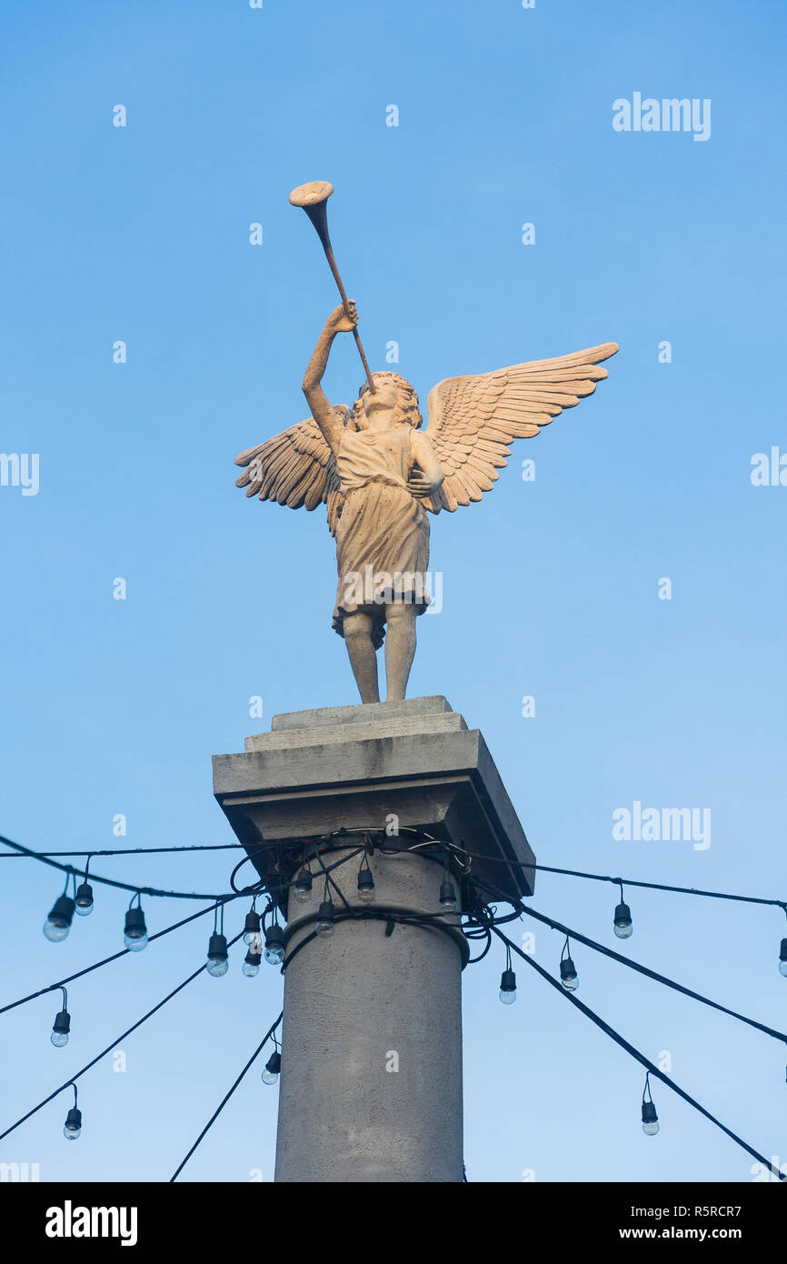 Angel blowing horn hi-res stock photography and images - Alamy