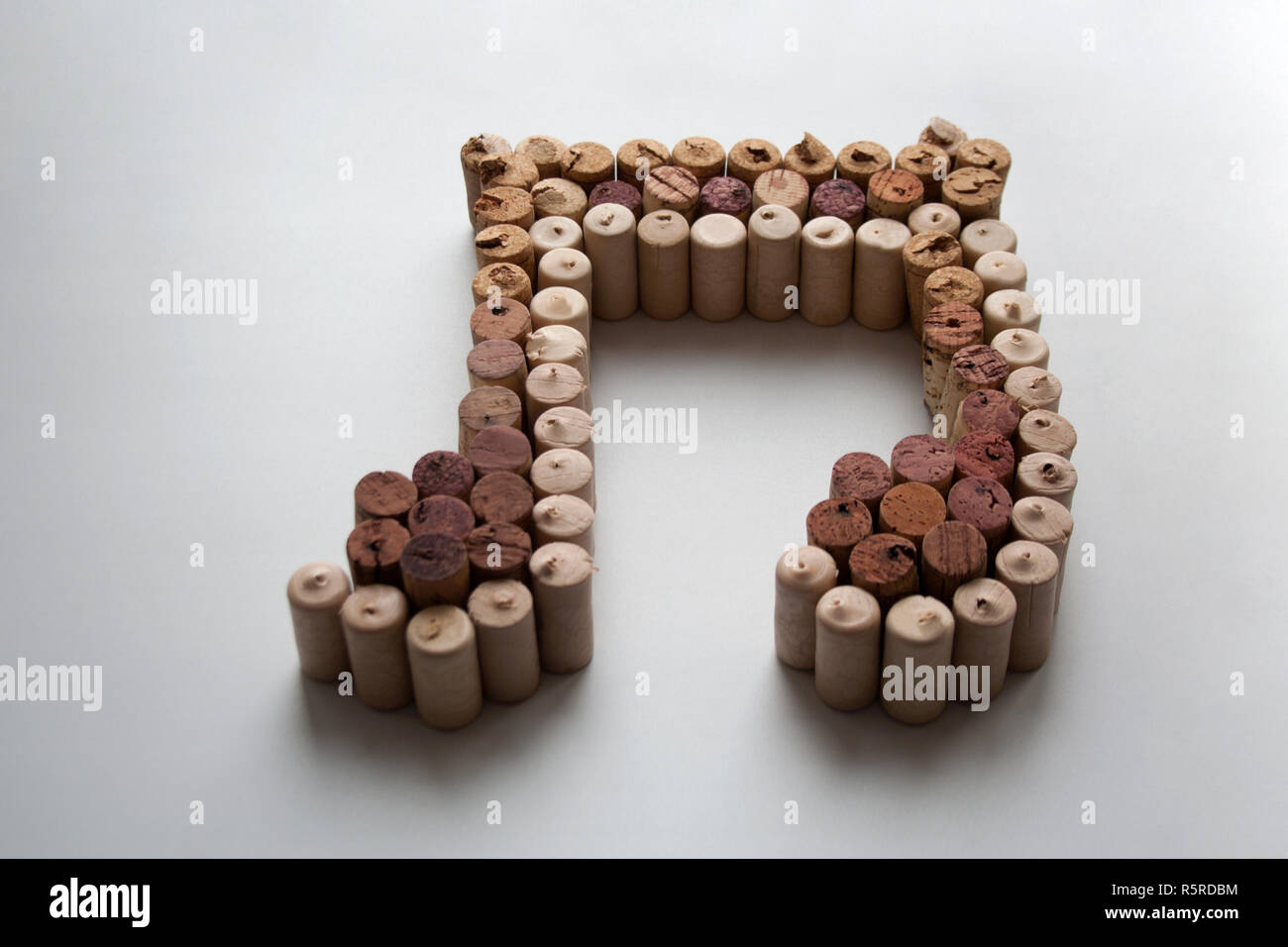 Wine corks music note isolated on white background Stock Photo - Alamy