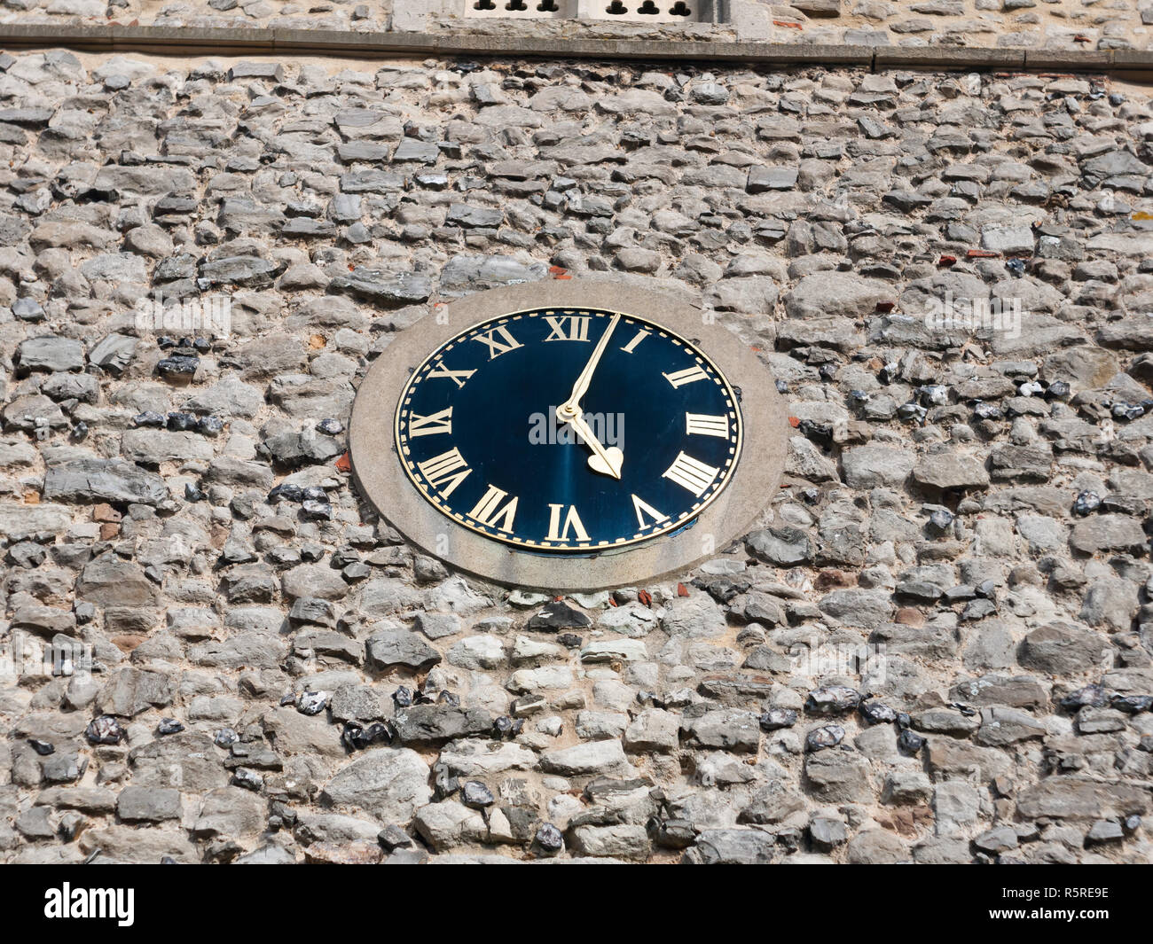 stunning old clock outside on church brick wall Stock Photo - Alamy