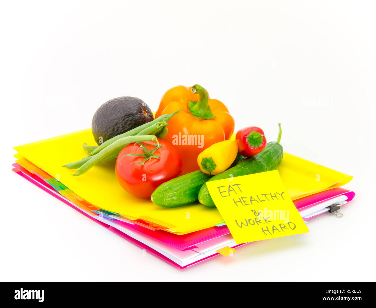 Office Documents and Vegetables Eat Healthy and Work Hard Stock Photo ...