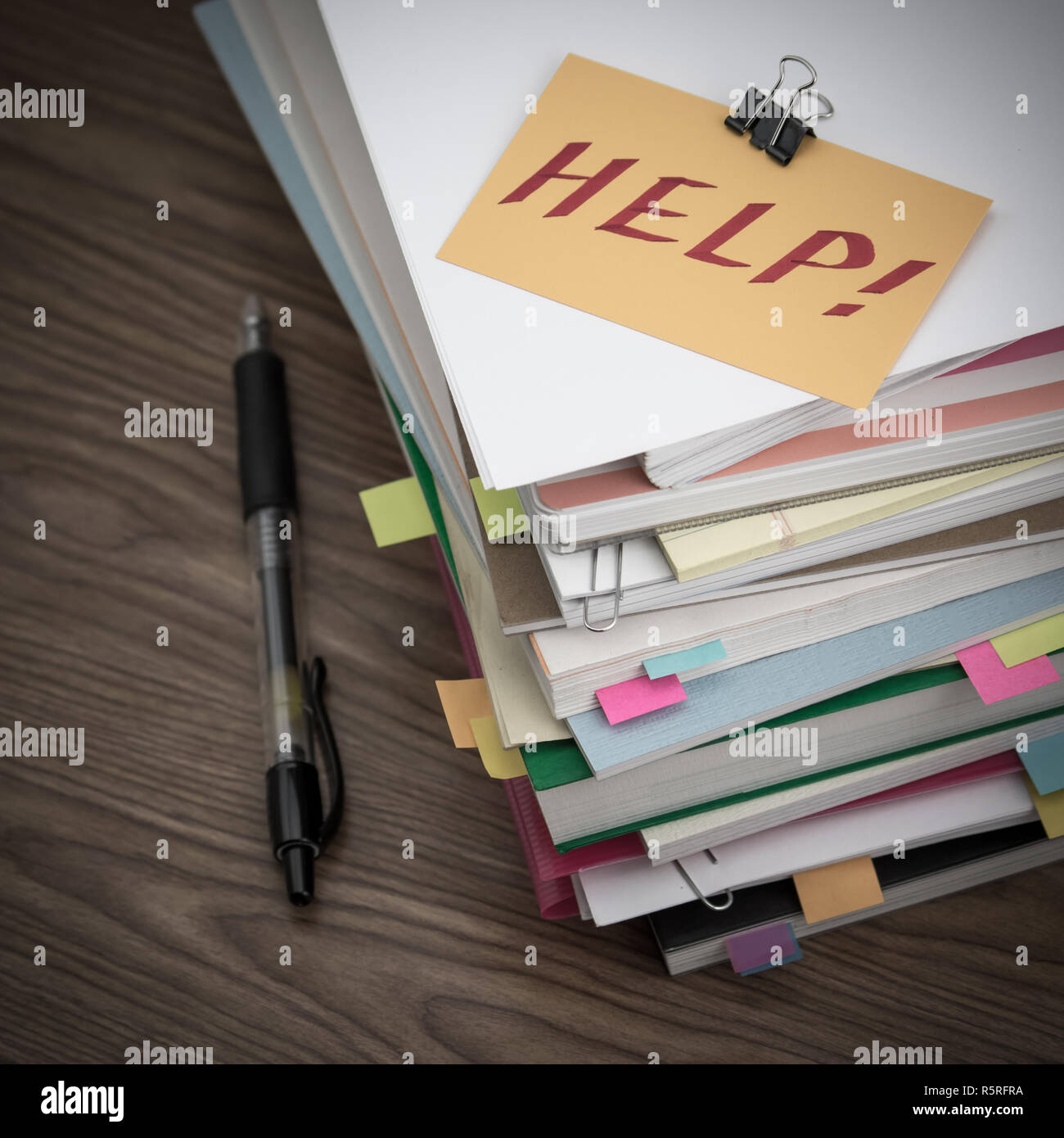 Help The Pile of Business Documents on the Desk Stock Photo - Alamy