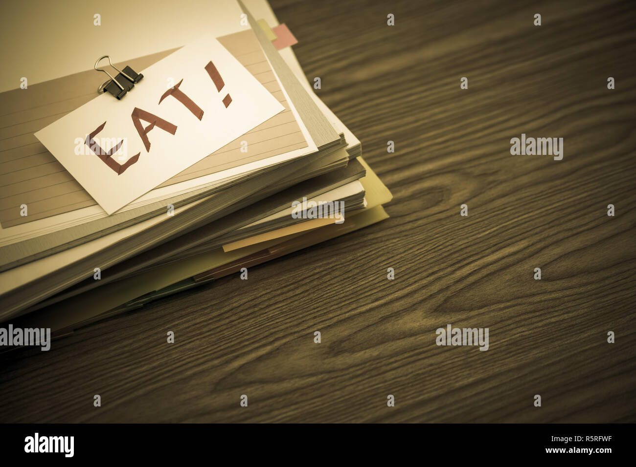 Eat The Pile of Business Documents on the Desk Stock Photo - Alamy
